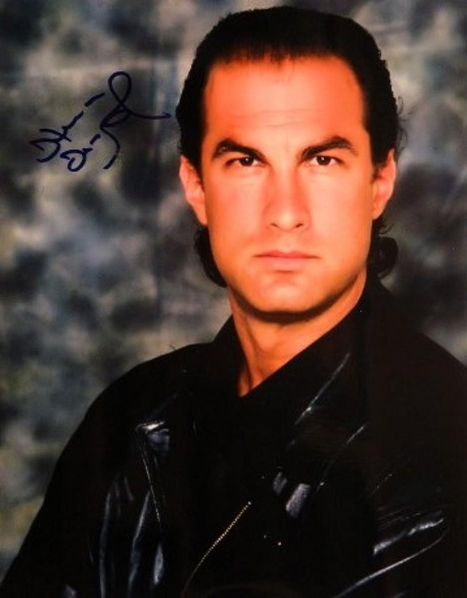 Steven Seagal signed portrait photo | EstateSales.org