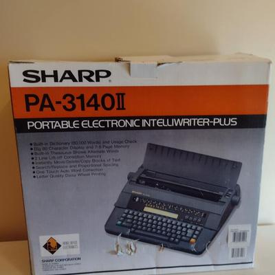 Sharp Portable Electric Typewriter Model PA-3140II | EstateSales.org