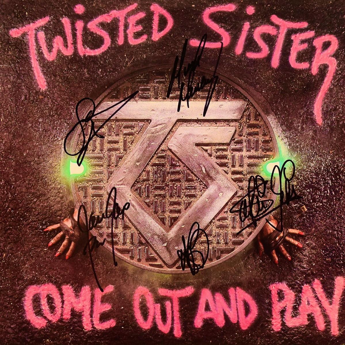 Twisted Sister signed Break Every Rule album | EstateSales.org