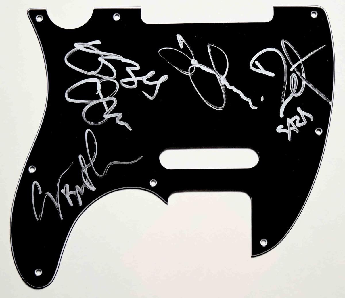 Black Sabbath signed pickguard | EstateSales.org