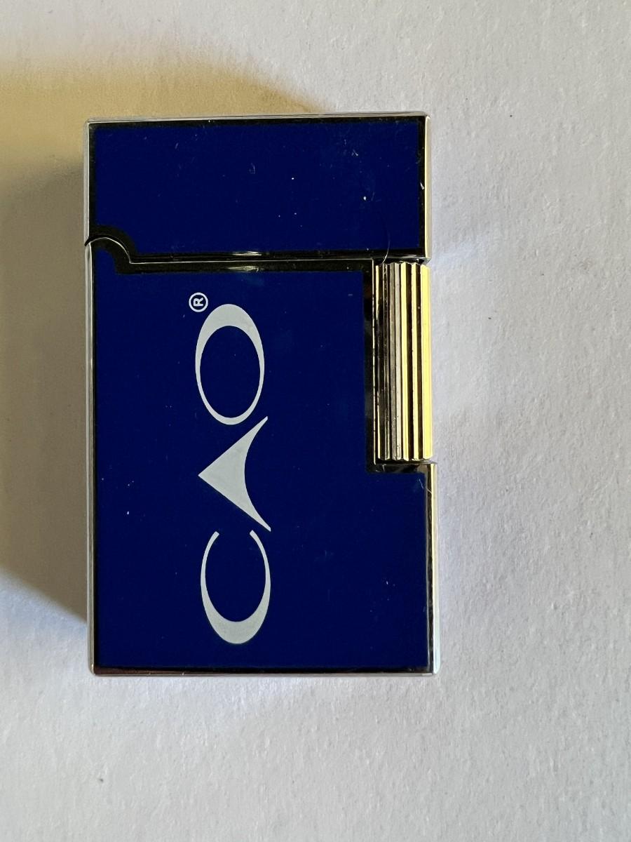 CAO butane lighter | EstateSales.org