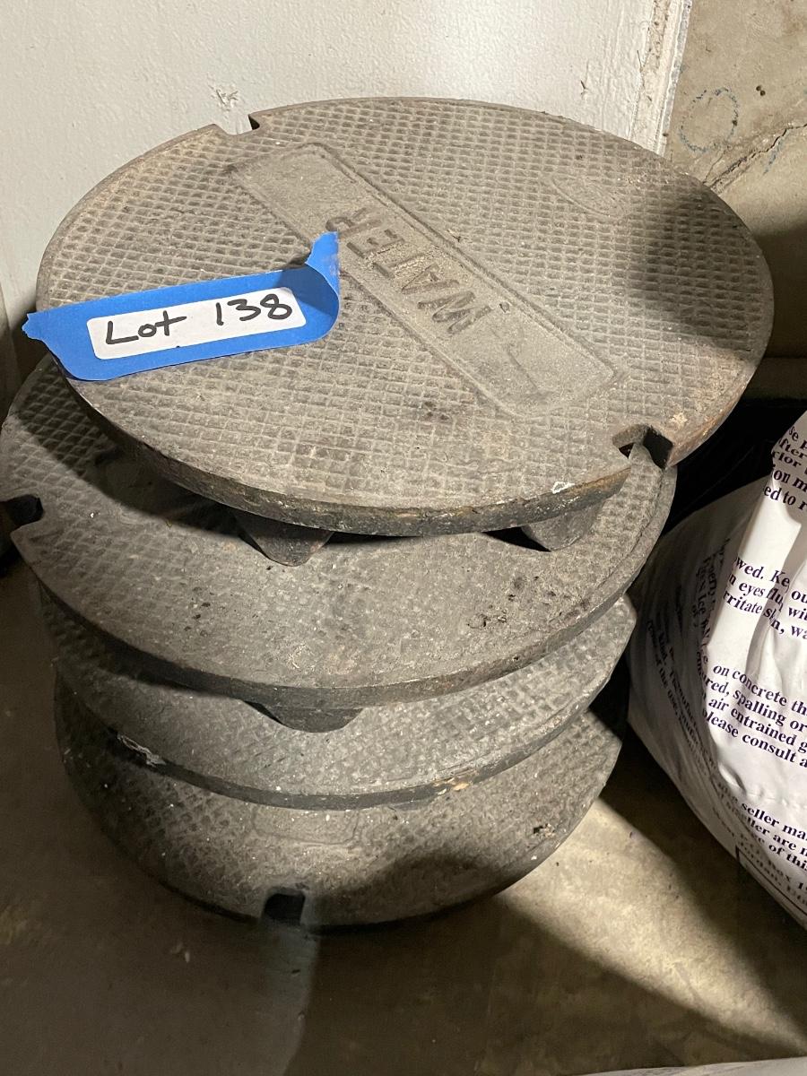 4 Cast Iron round drain/water pipe covers - Metal | EstateSales.org