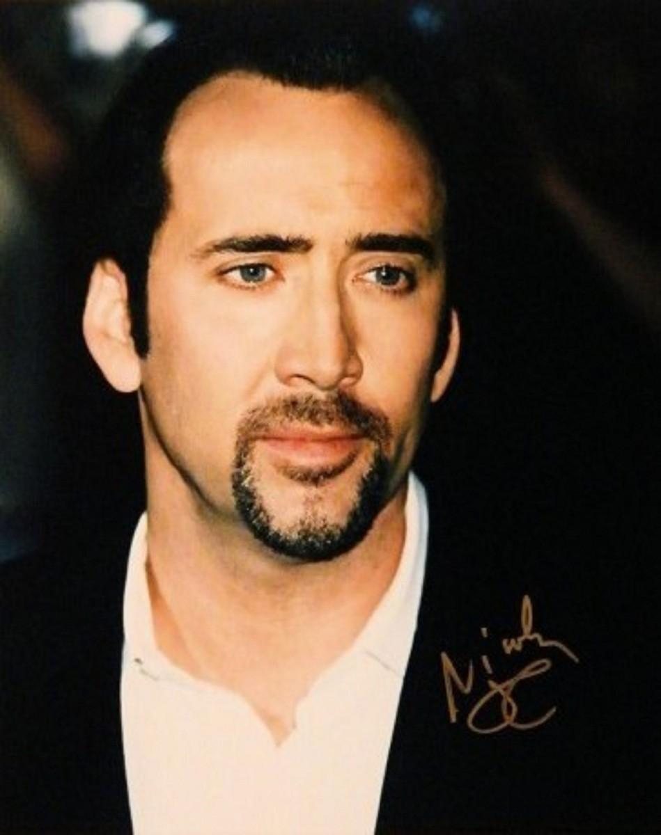 Nicholas Cage signed portrait photo | EstateSales.org