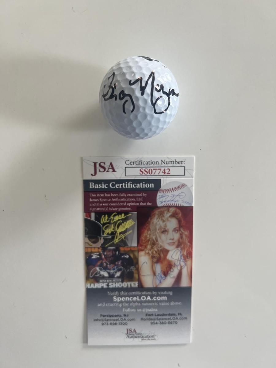 Caddyshack Cindy Morgan signed golf ball. JSA | EstateSales.org