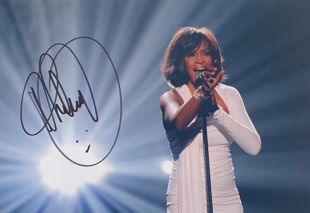 Whitney Houston signed photo | EstateSales.org