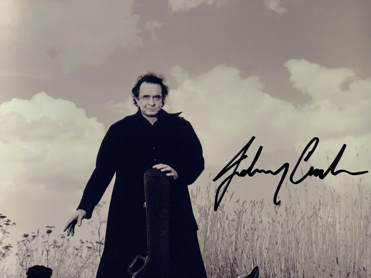 Johnny Cash signed photo | EstateSales.org