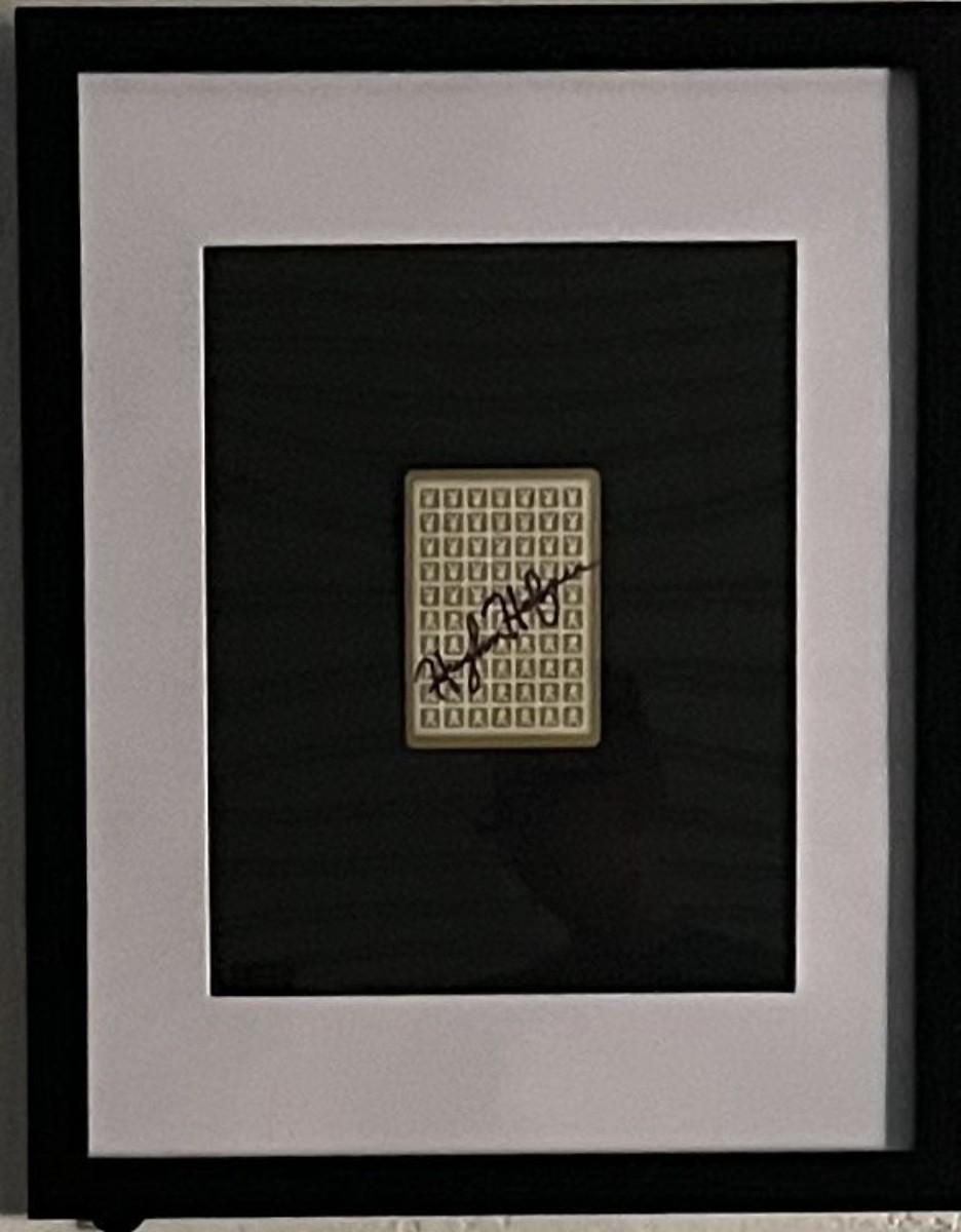 Hugh Hefner signed playing card. GFA authenticated | EstateSales.org