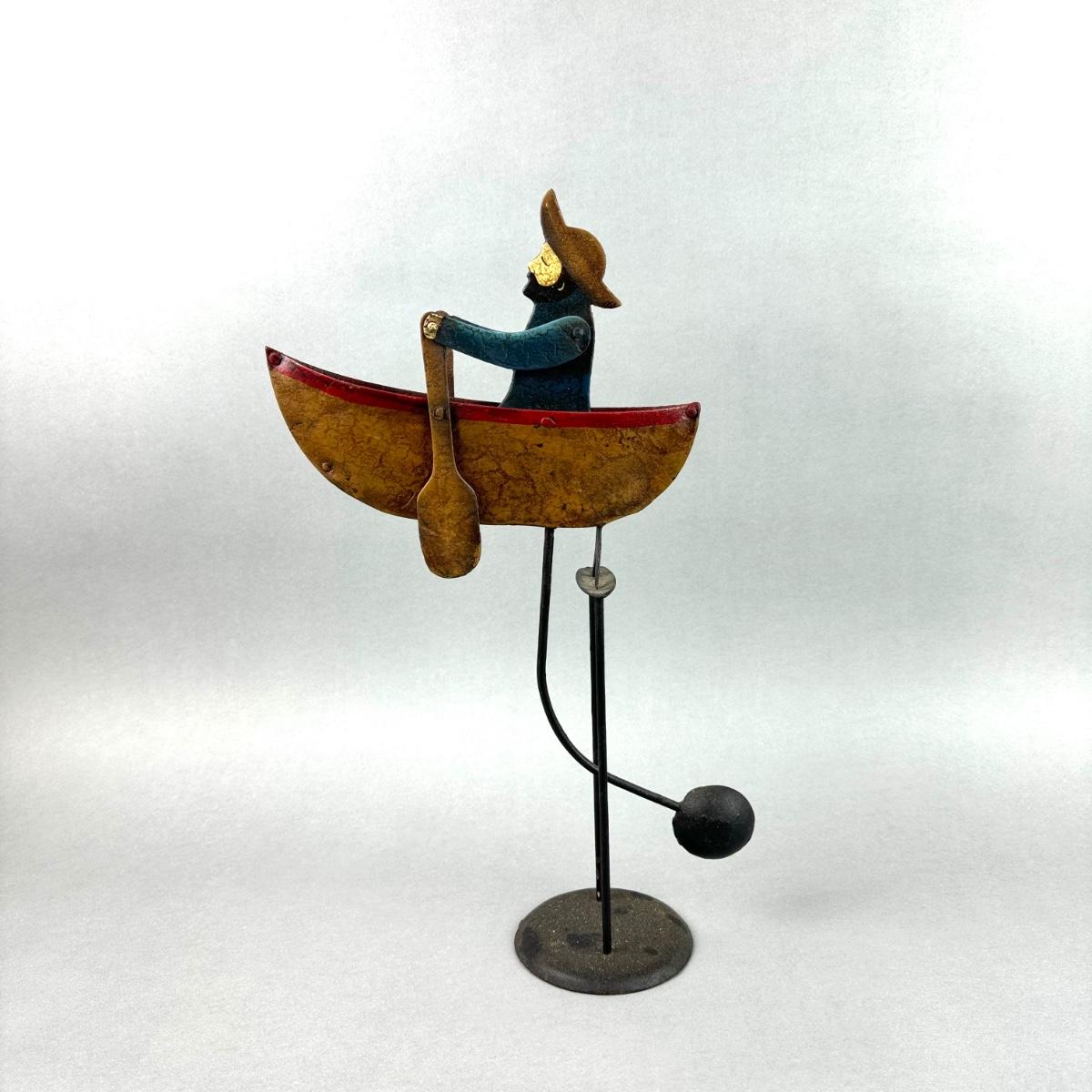 LR016 Sailor in Boat Metal Pendulum | EstateSales.org
