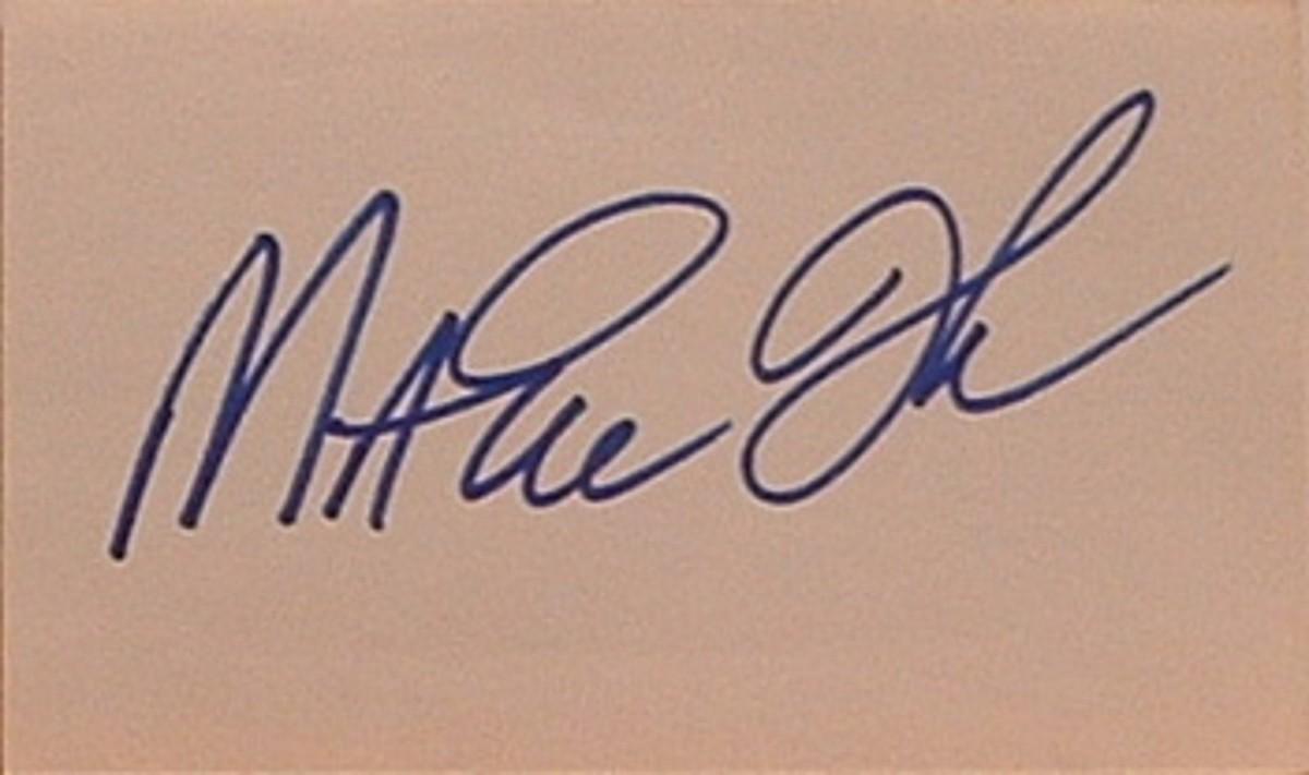 Magic Johnson signature slip | EstateSales.org