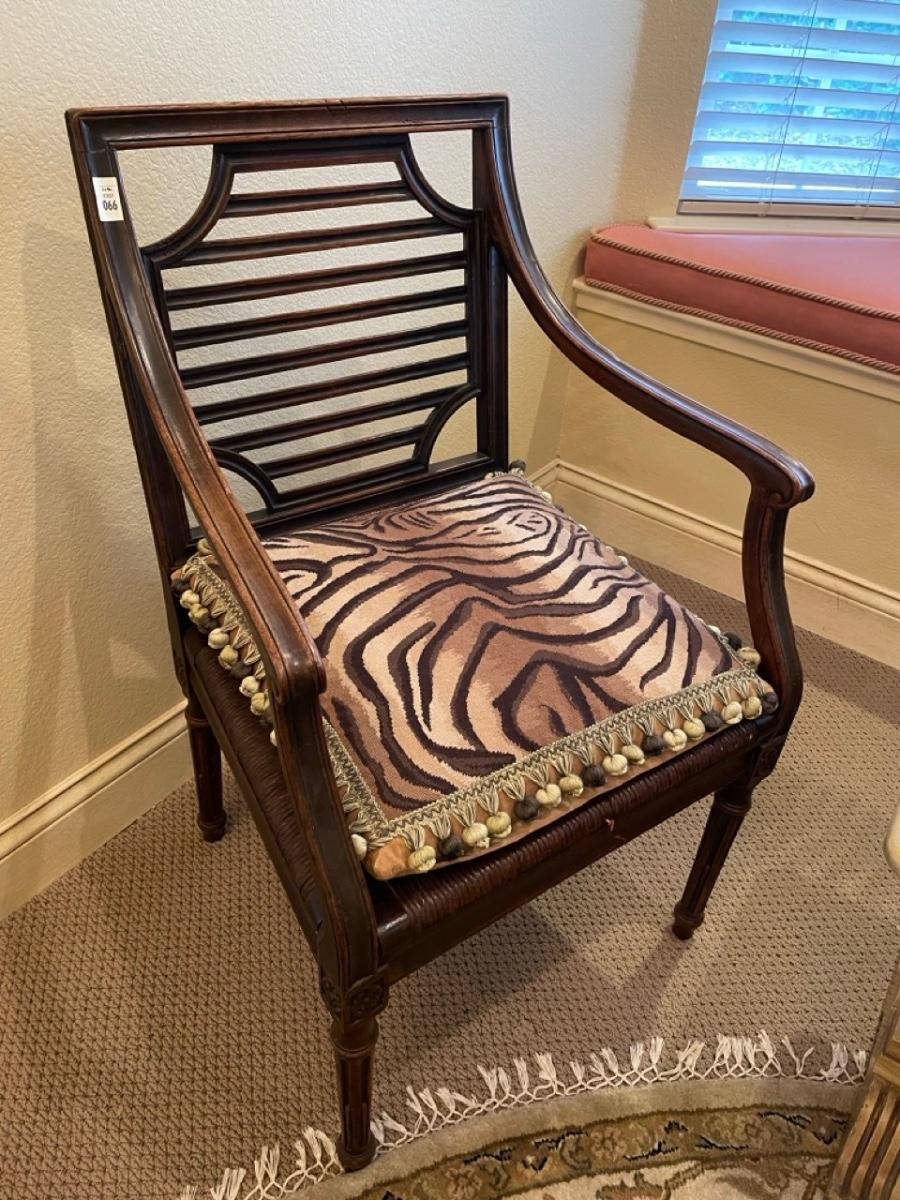 Beautiful arm chair with animal print pillow | EstateSales.org