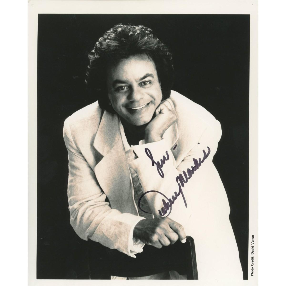 Johnny Mathis signed photo | EstateSales.org