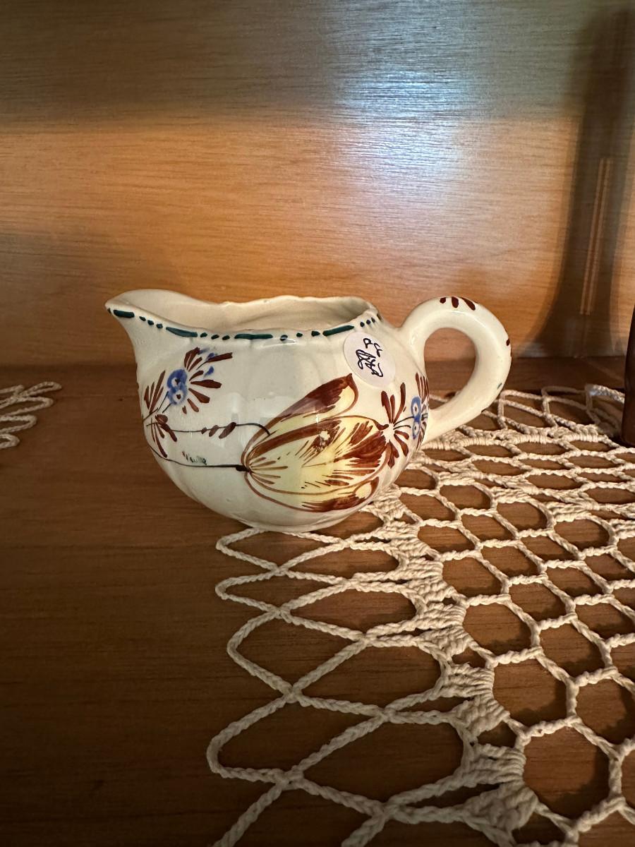 Vintage Pottery Stoke-on-Trent brown and blue creamer | EstateSales.org