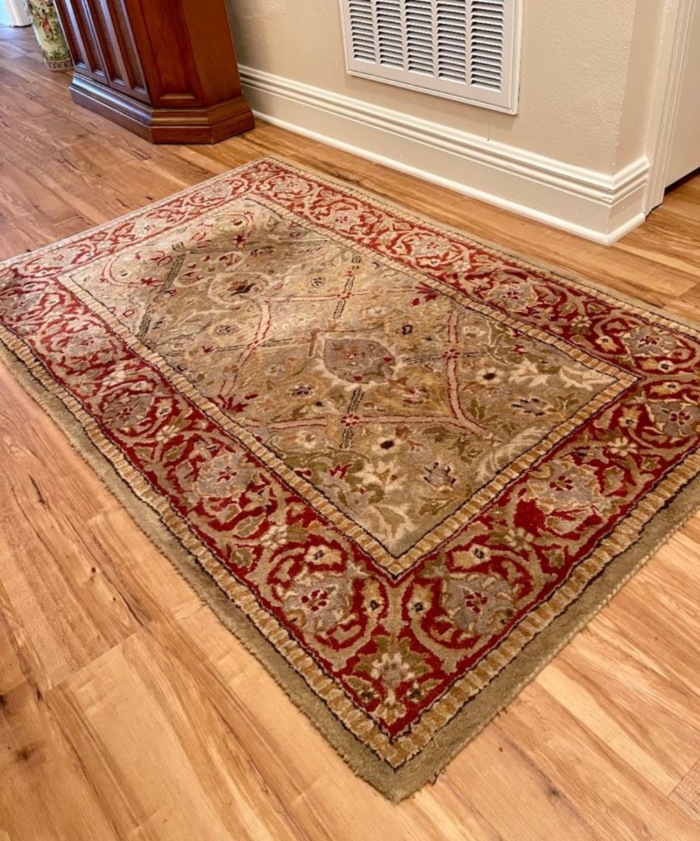 Burgundy gold rug | EstateSales.org