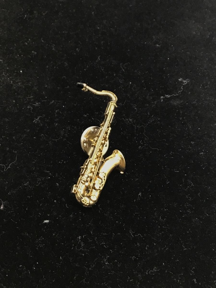 Future primative saxophone pin | EstateSales.org
