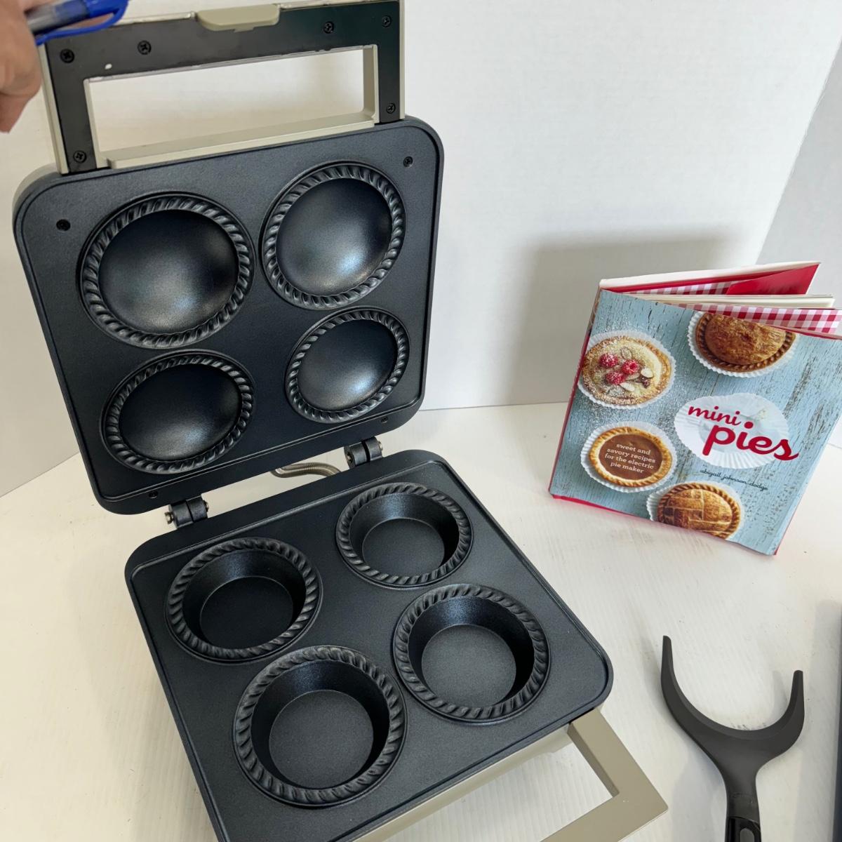 282 Breville Mini Pie Maker with cookbook | EstateSales.org