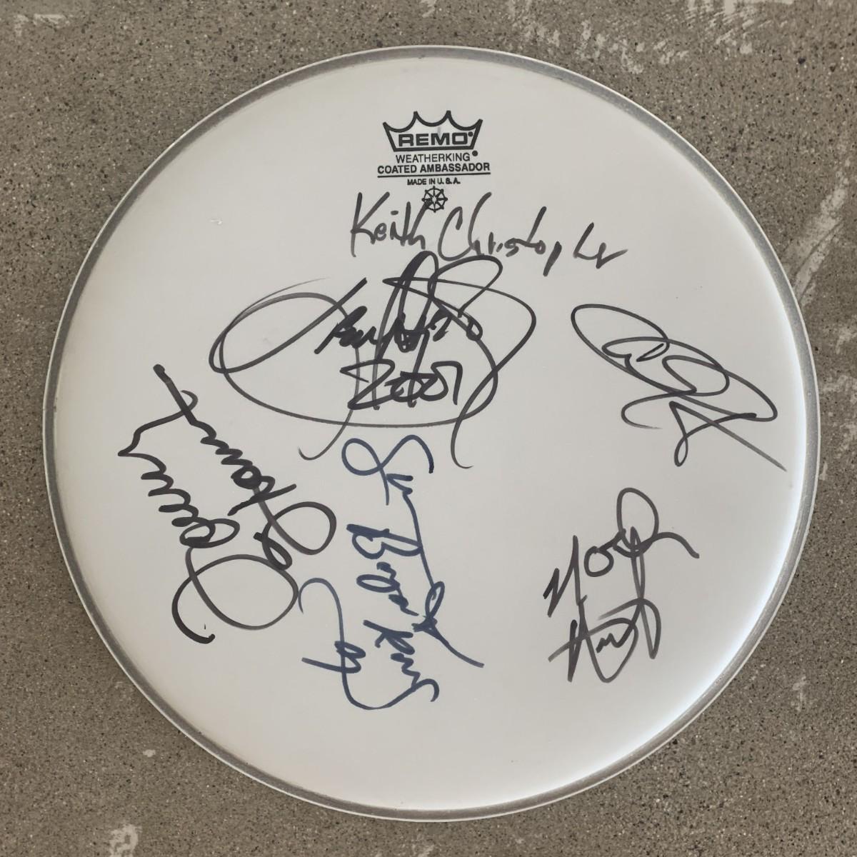 Kenny Wayne Shepherd Band signed drum head | EstateSales.org