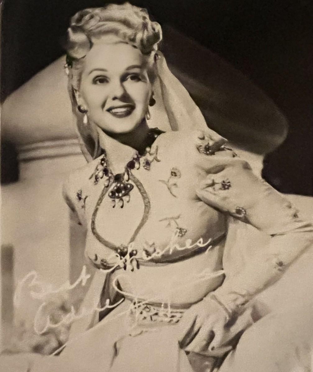 Adele Jergens facsimile signed photo. 3x5 inches | EstateSales.org