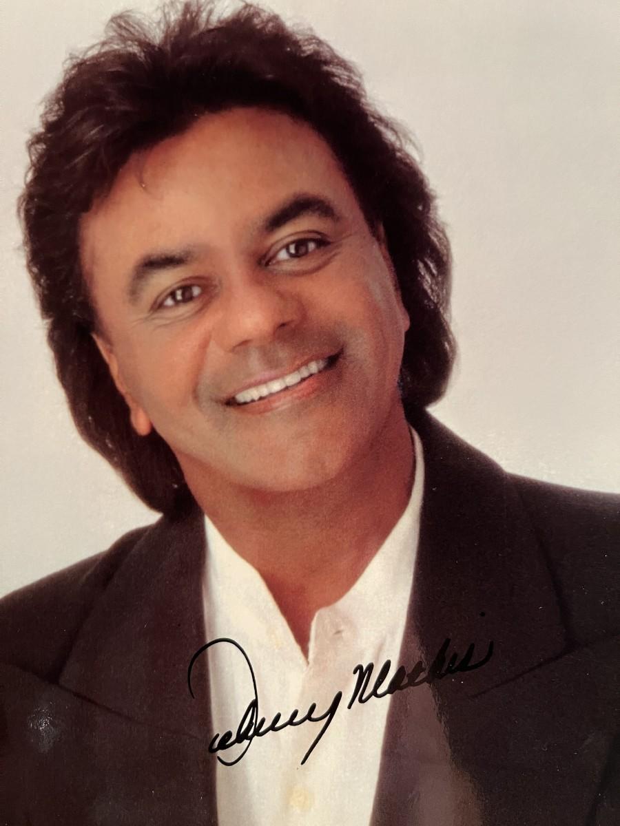 Johnny Mathis facsimile signed photo. 8x10 inches | EstateSales.org