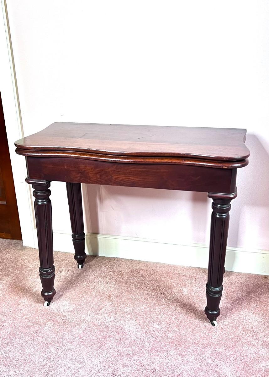 Vintage Solid Wood Drop Leaf Convertible Table on Casters | EstateSales.org