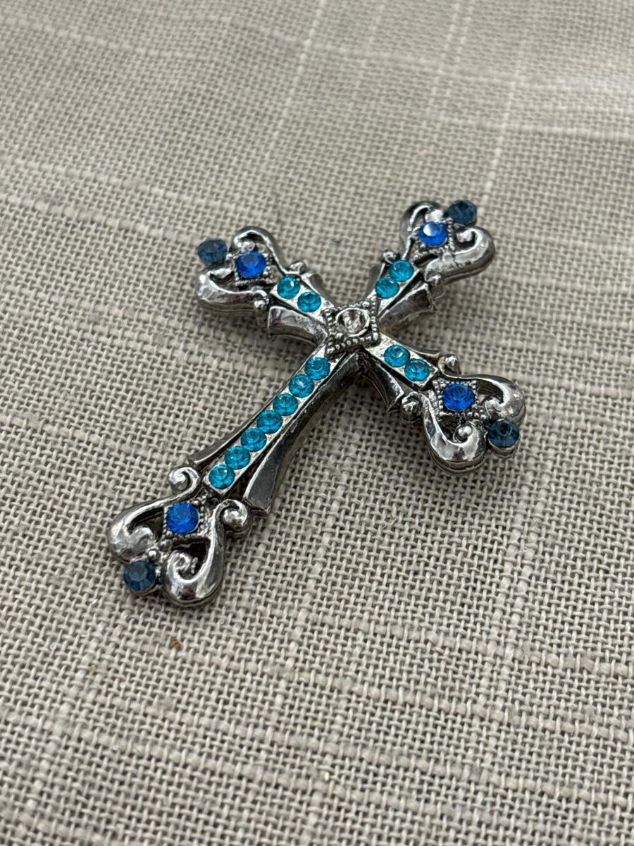 Silver tone blue rhinestone cross pin | EstateSales.org