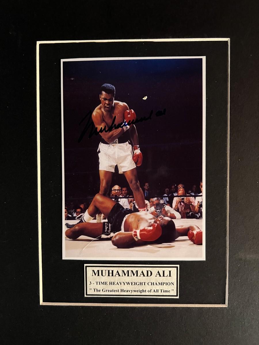 Muhammad Ali signed photo | EstateSales.org