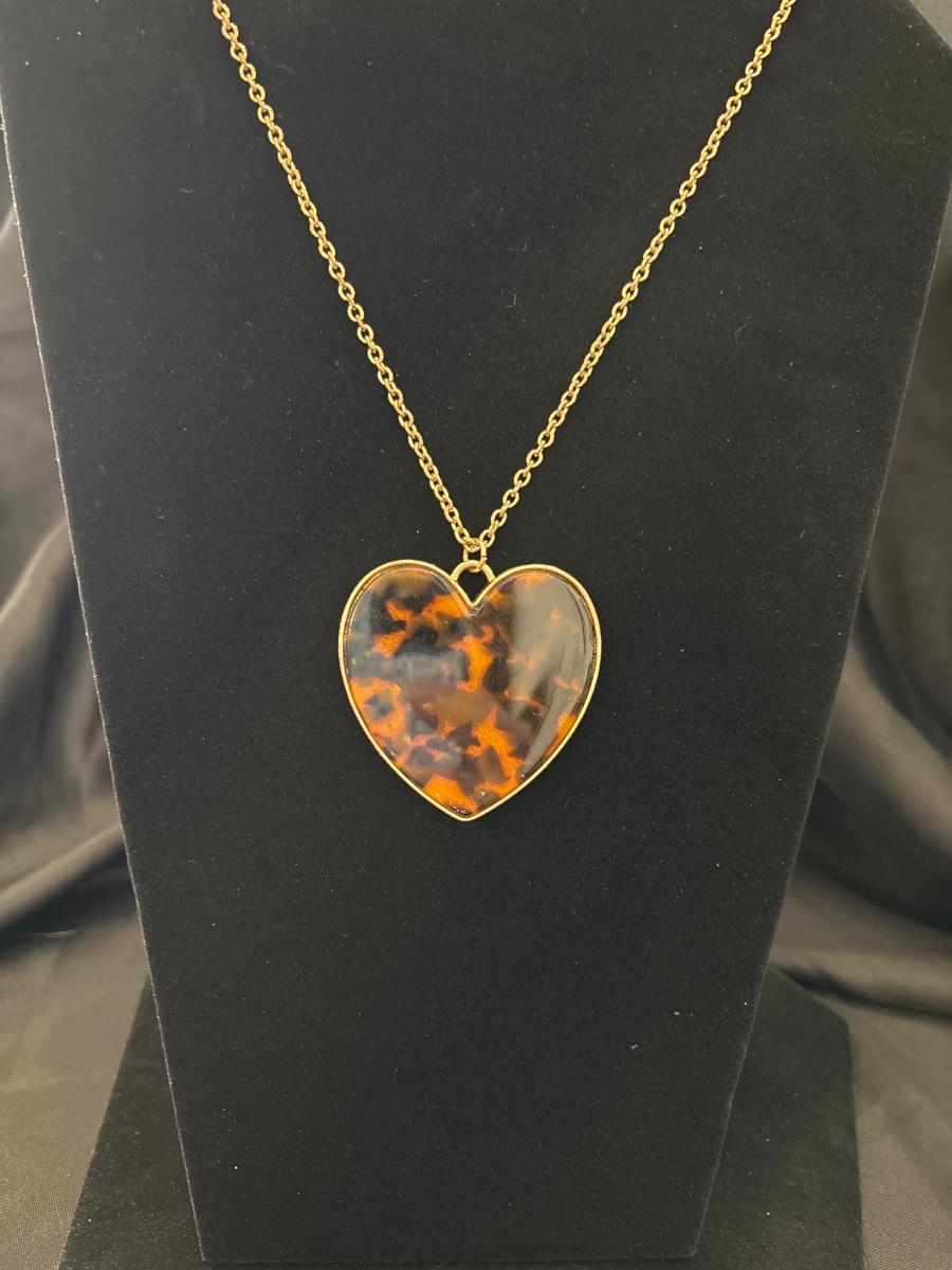 Cute part, gold toned faux tortoise shell necklace | EstateSales.org