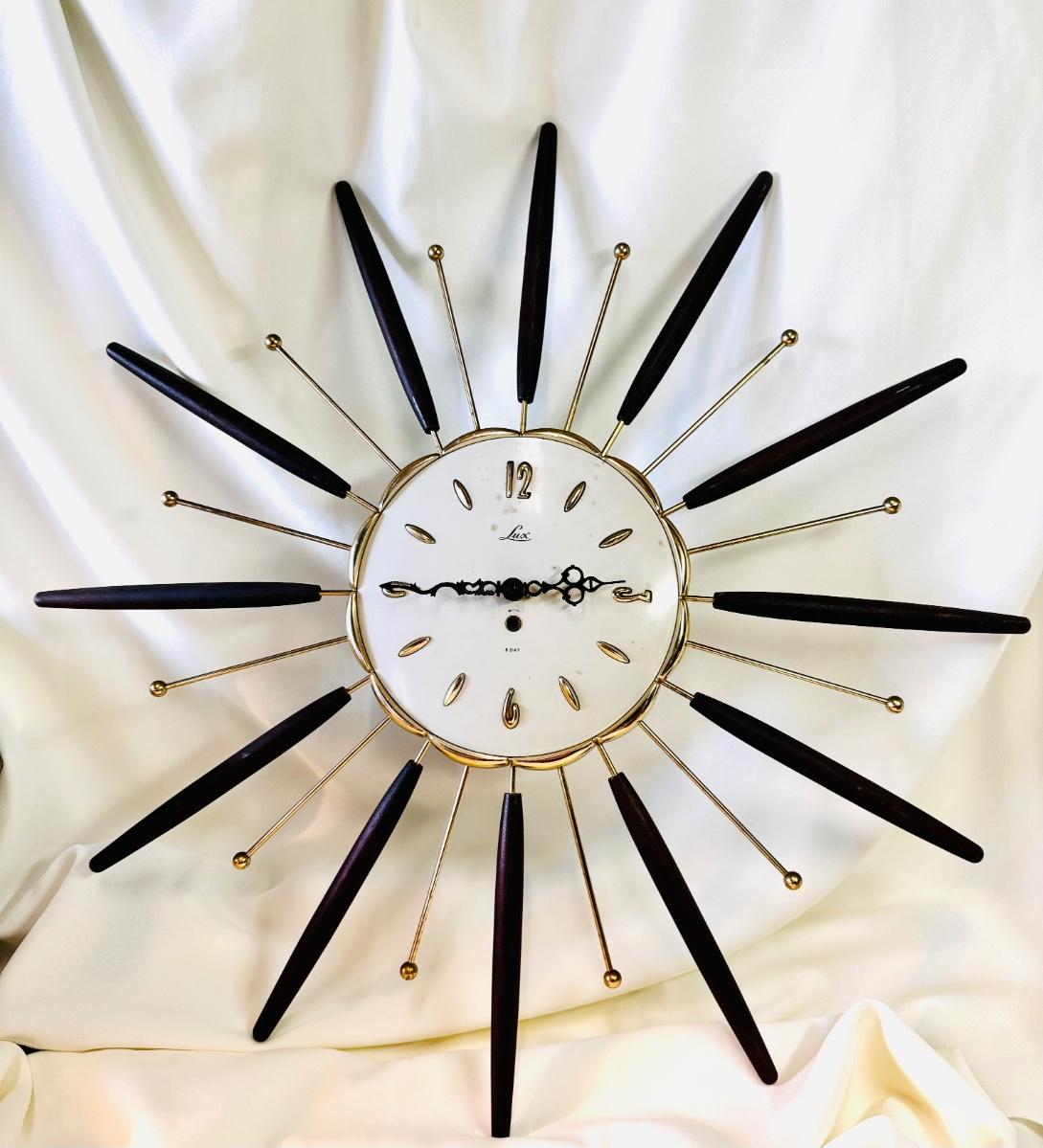 MCM Starburst Clock - 8 day with key | EstateSales.org
