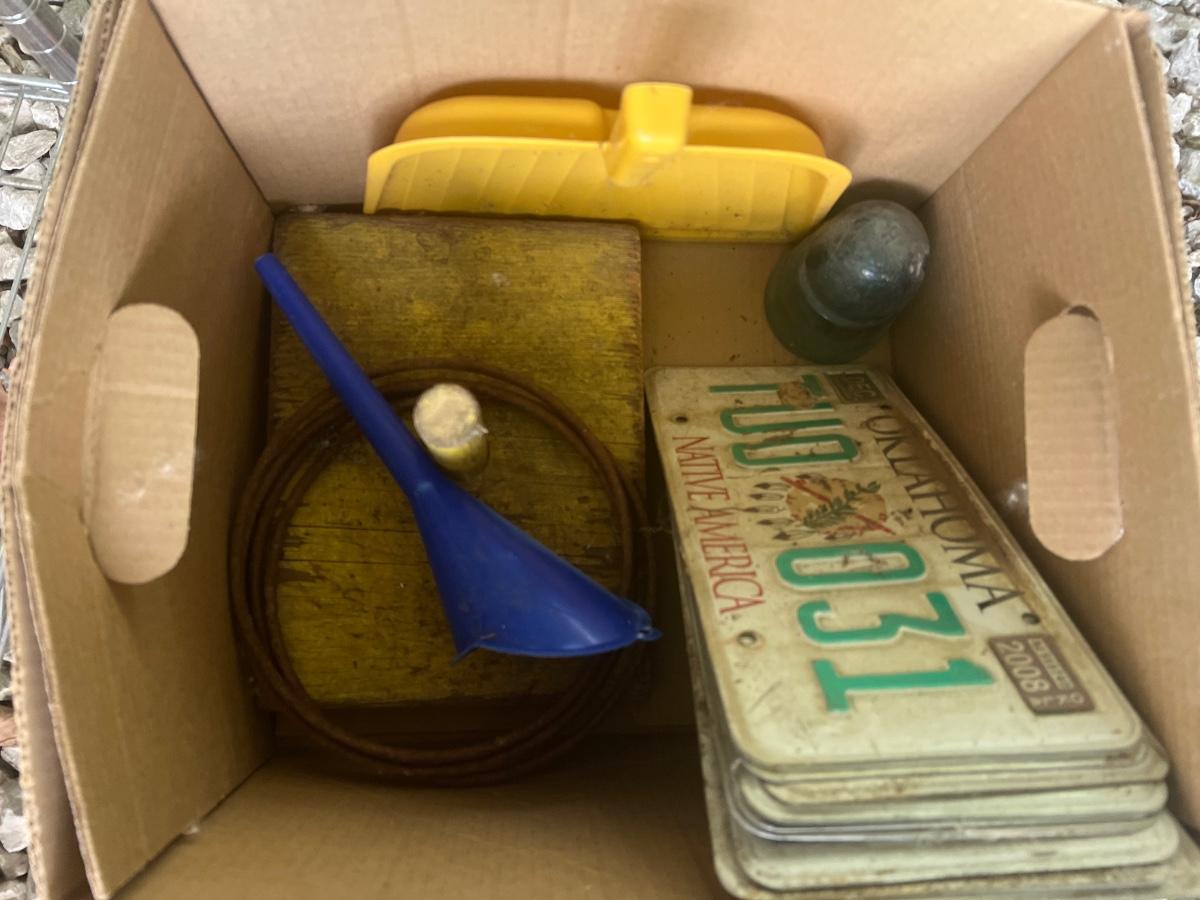 Box with License Plates, Green Glass Insulator, etc | EstateSales.org