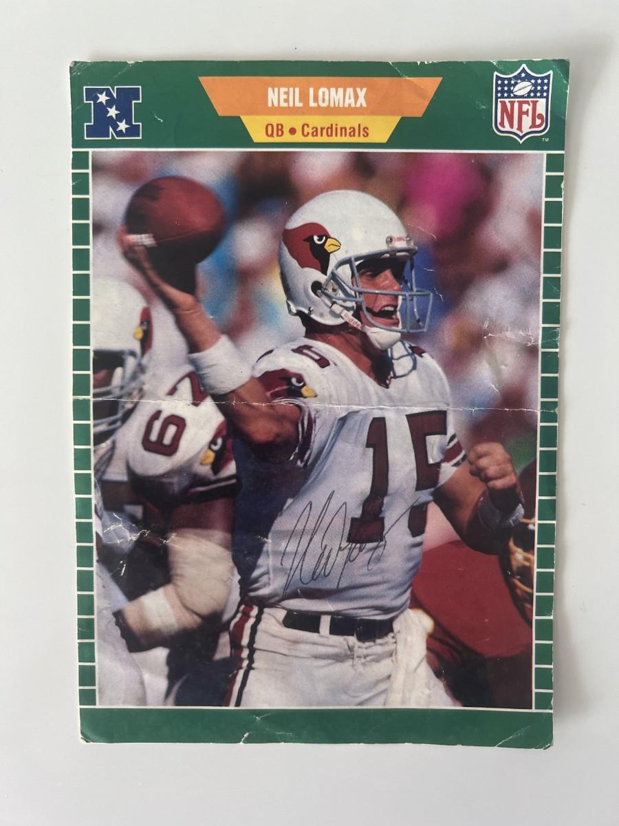 NFL player Neil Lomax signed photo | EstateSales.org