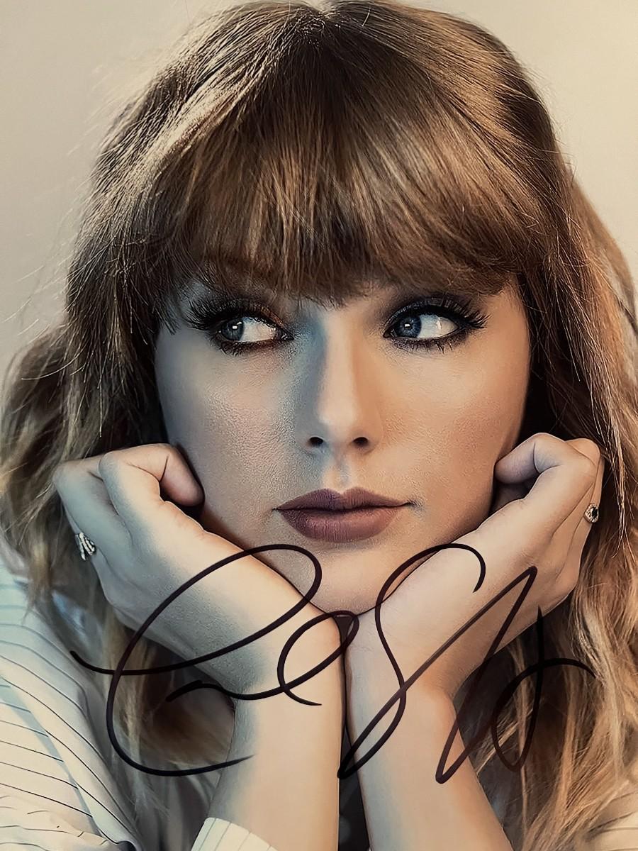 Taylor Swift signed photo | EstateSales.org