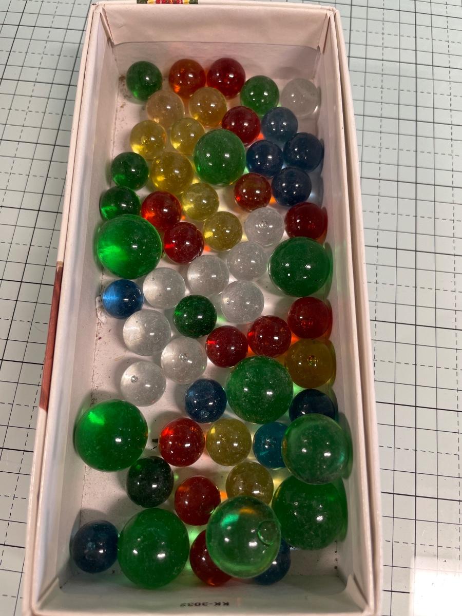 Small box of marbles | EstateSales.org