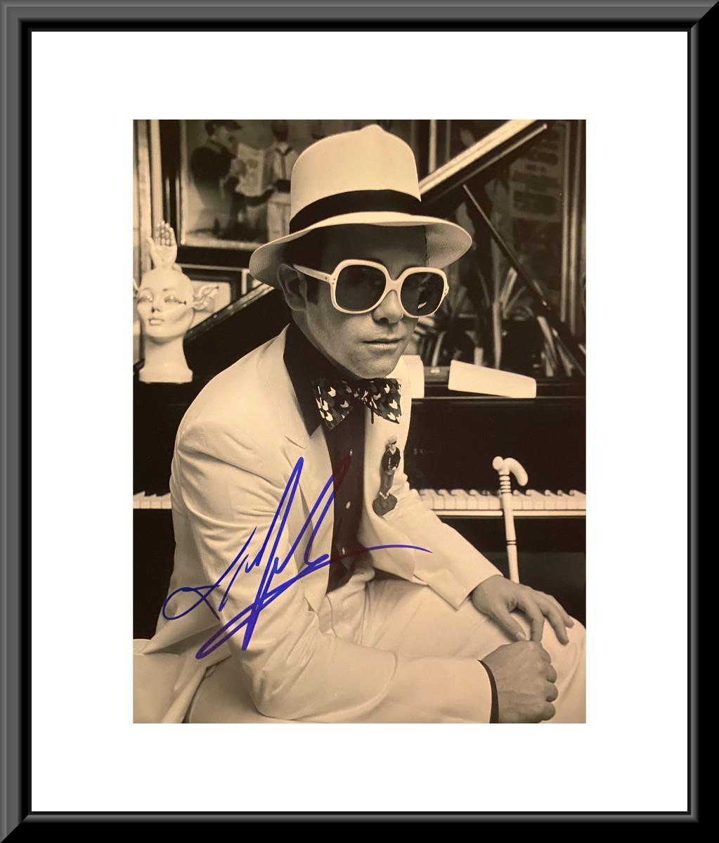 Elton John signed photo | EstateSales.org
