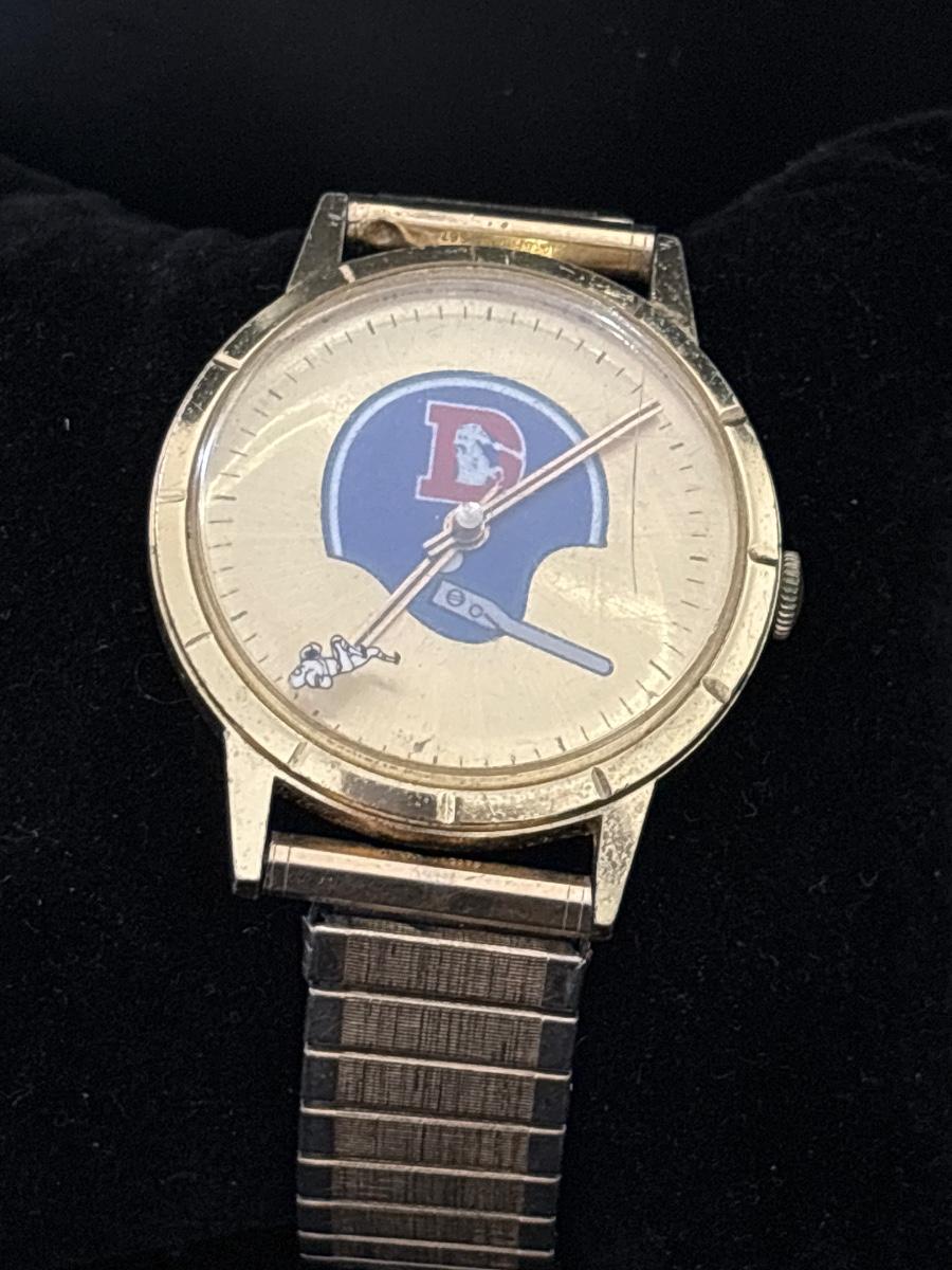 Gold tone Denver Broncos watch | EstateSales.org