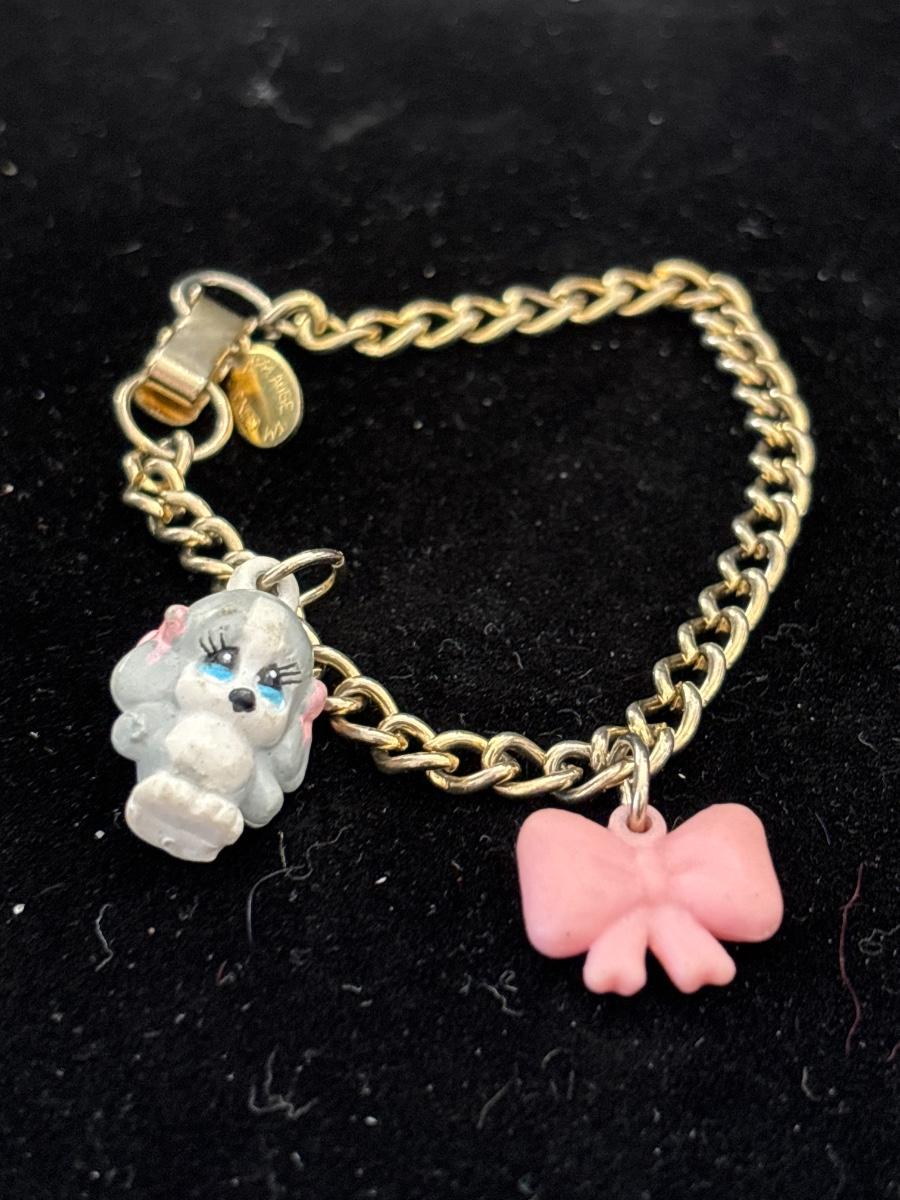 Applause China gold tone chain bracelet with charms | EstateSales.org