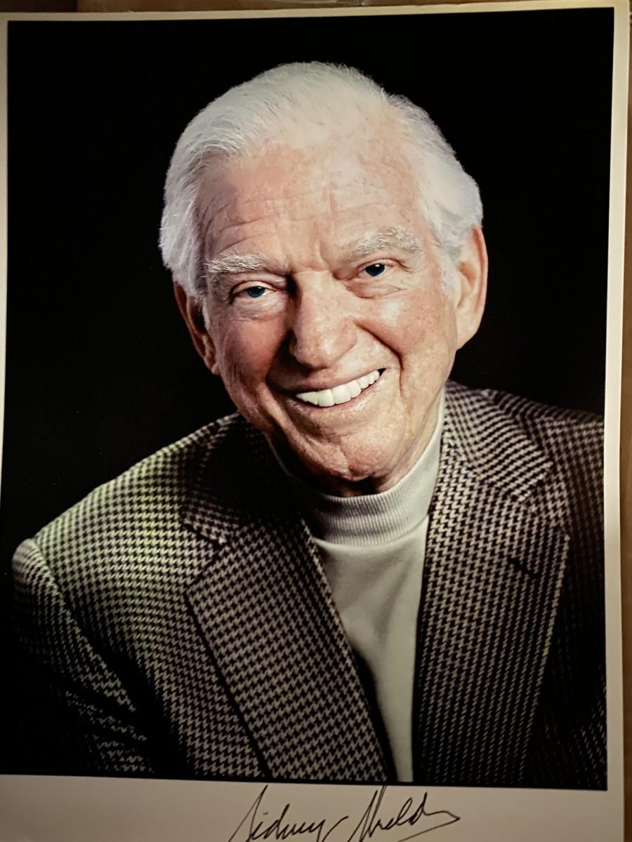 Author Sydney Sheldon signed photo | EstateSales.org