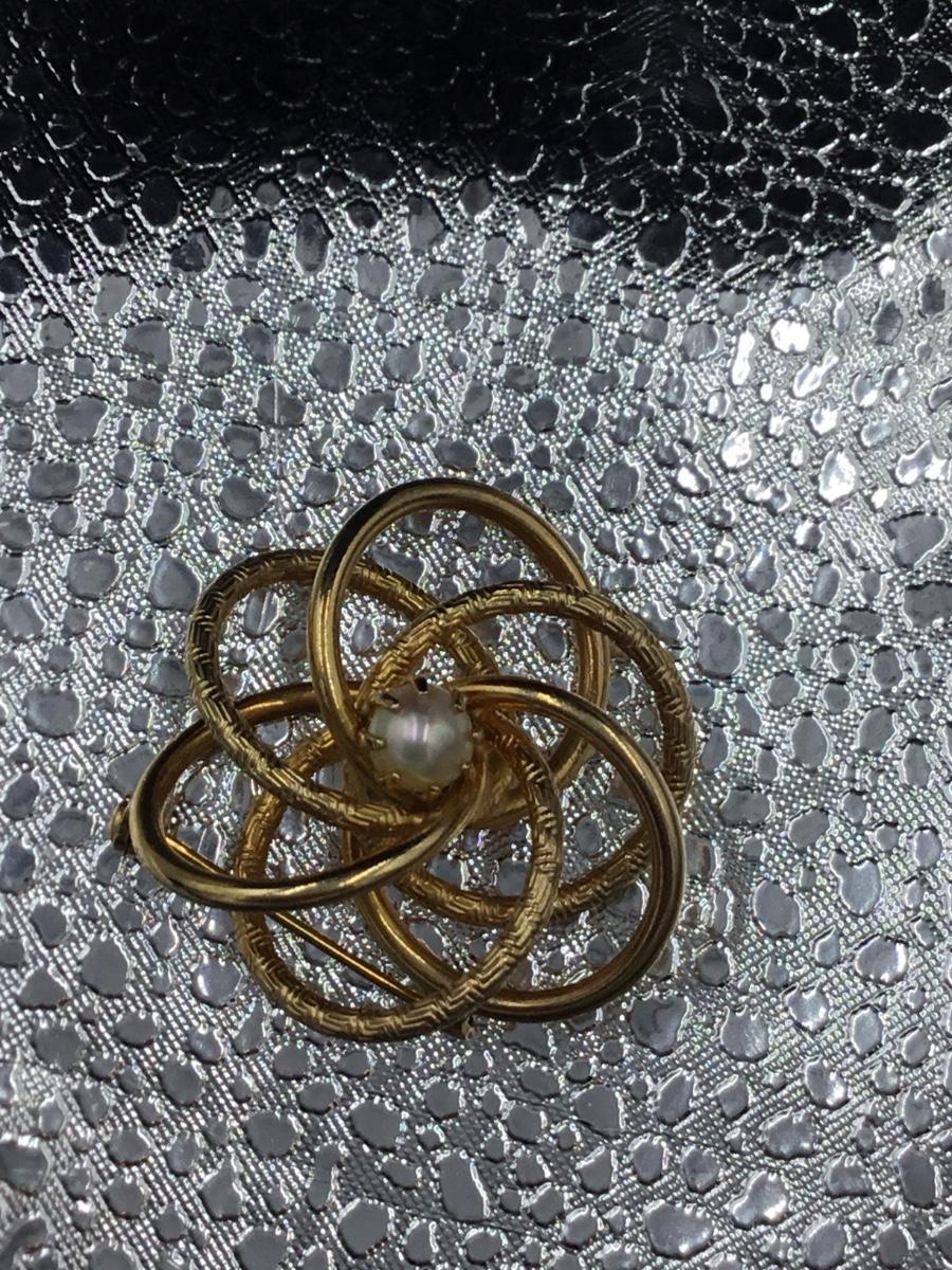 Gold tone spiral pin | EstateSales.org