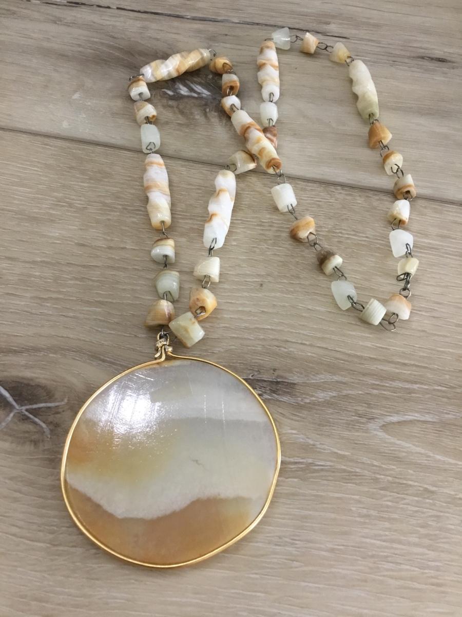 Super cool, vintage shell type necklace | EstateSales.org