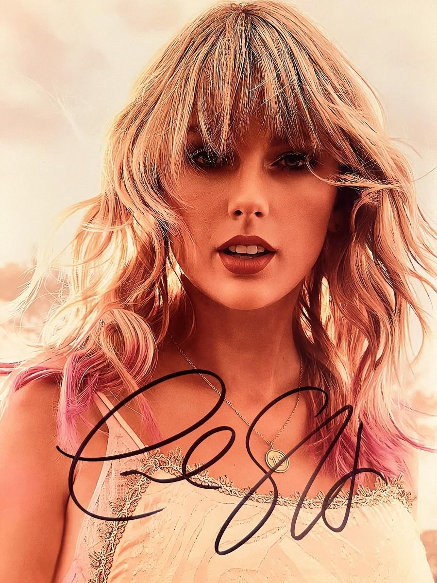 Taylor Swift signed photo | EstateSales.org
