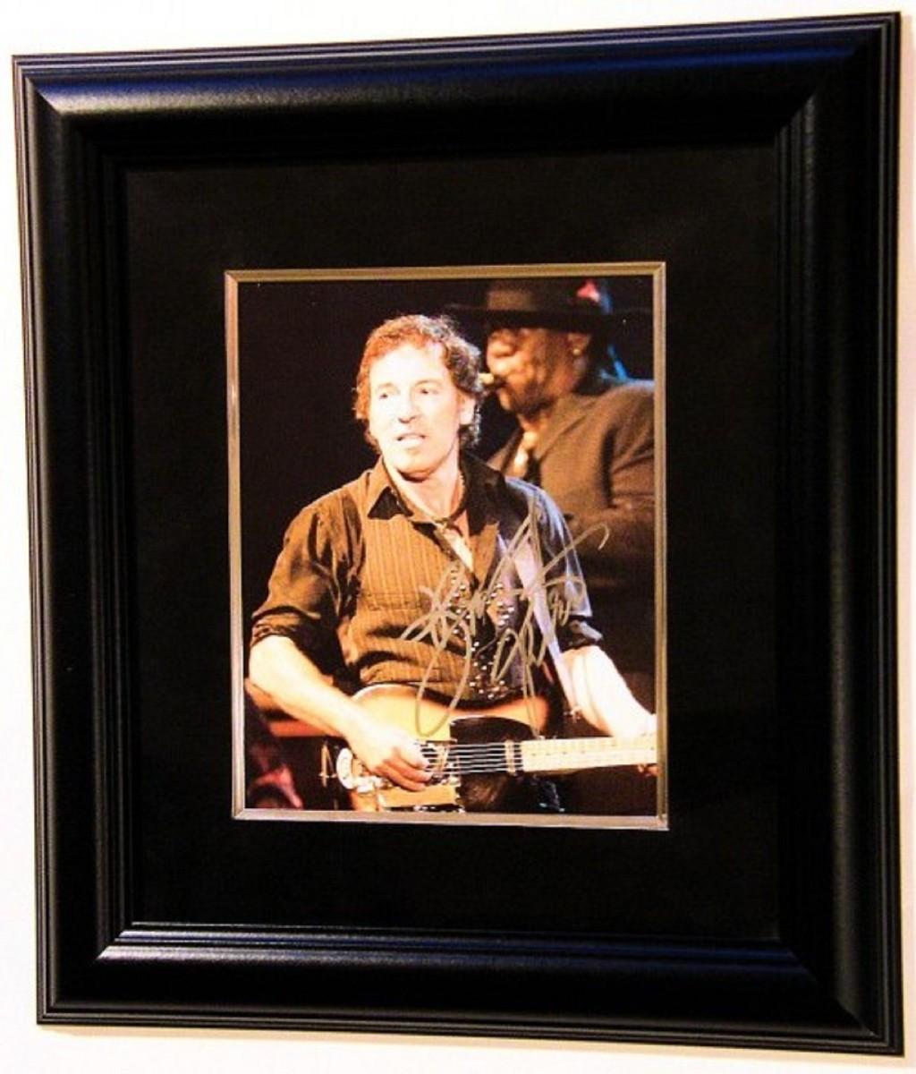 Framed Bruce Springsteen signed photo | EstateSales.org