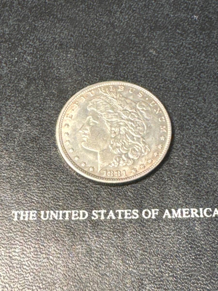 1881 S MORGAN AU 58 US COIN 1$ silver | EstateSales.org