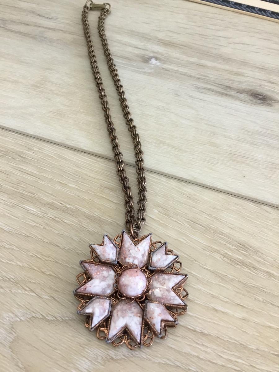 Copper pink medallion type mid century necklace | EstateSales.org