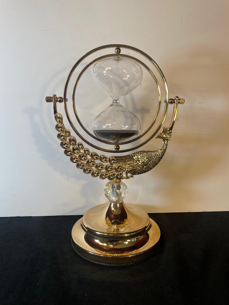 Lot 135. Decorative Hourglass | EstateSales.org