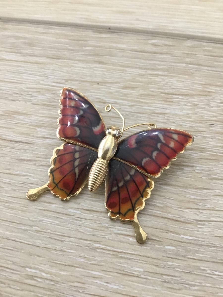 Gold tone red vintage butterfly pin | EstateSales.org