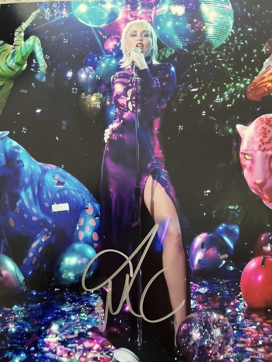 Miley Cyrus signed photo | EstateSales.org
