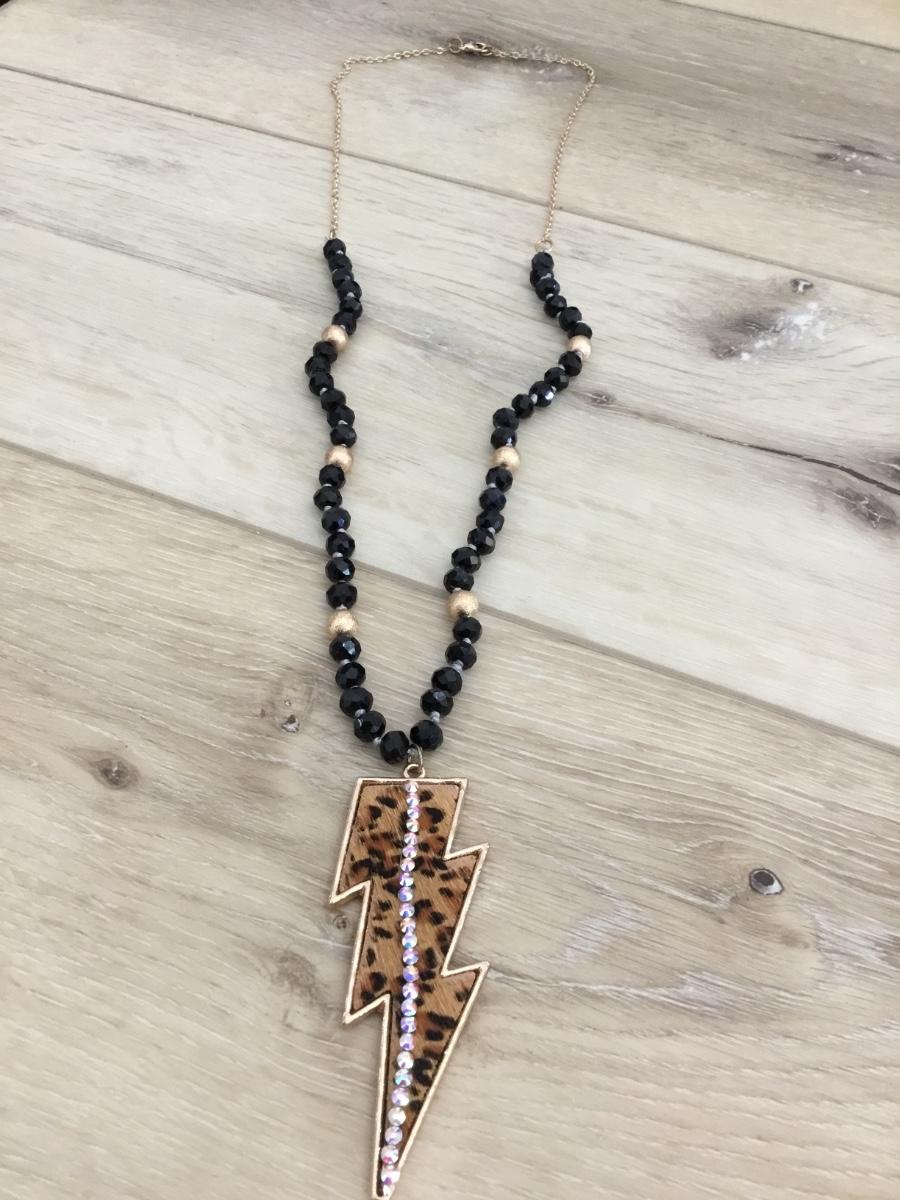 Gold tone black glass bead necklace with with lightning bolt pendant ...