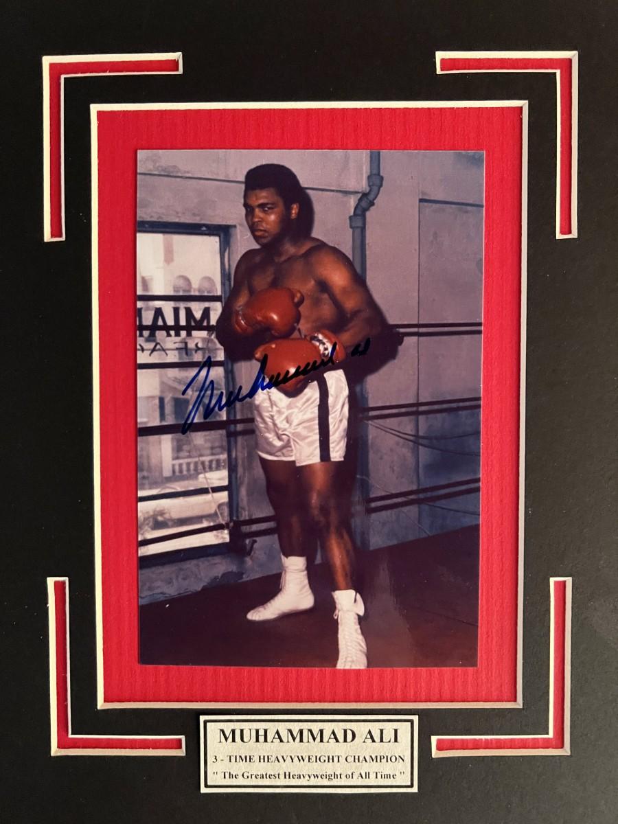 Muhammad Ali signed photo | EstateSales.org