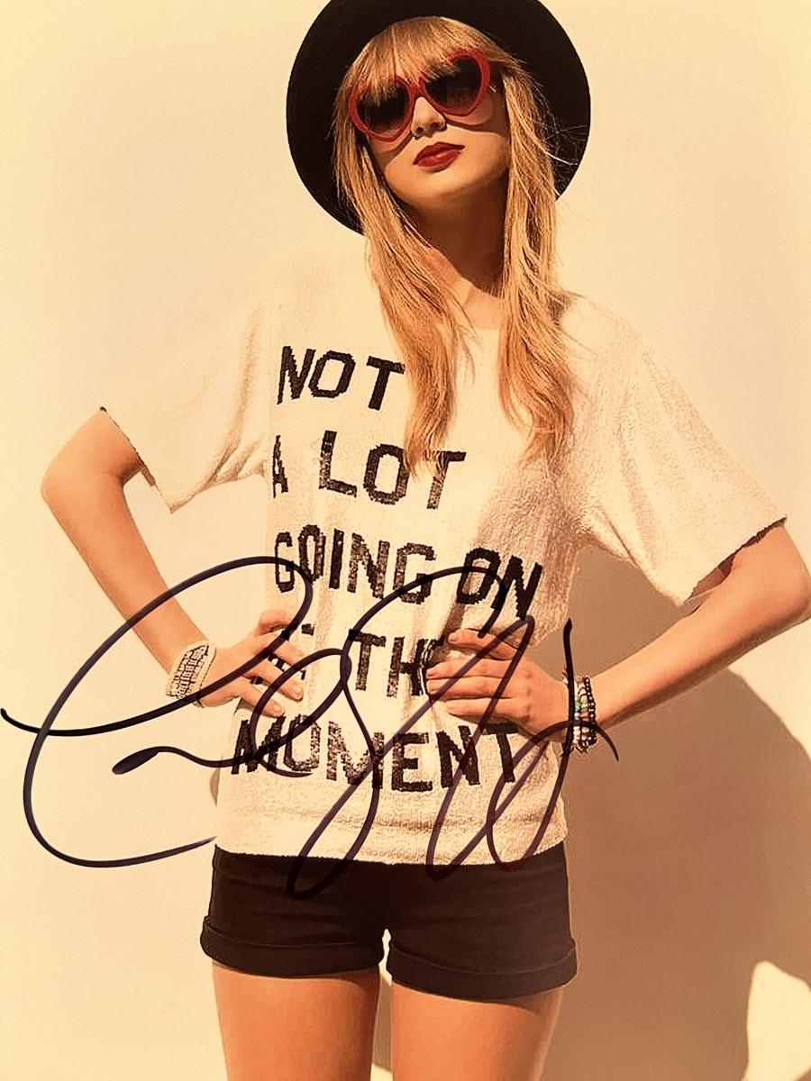Taylor Swift signed photo | EstateSales.org
