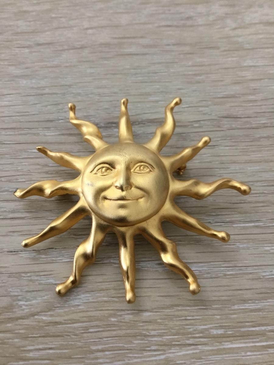 Gold tone sun brooch vintage | EstateSales.org