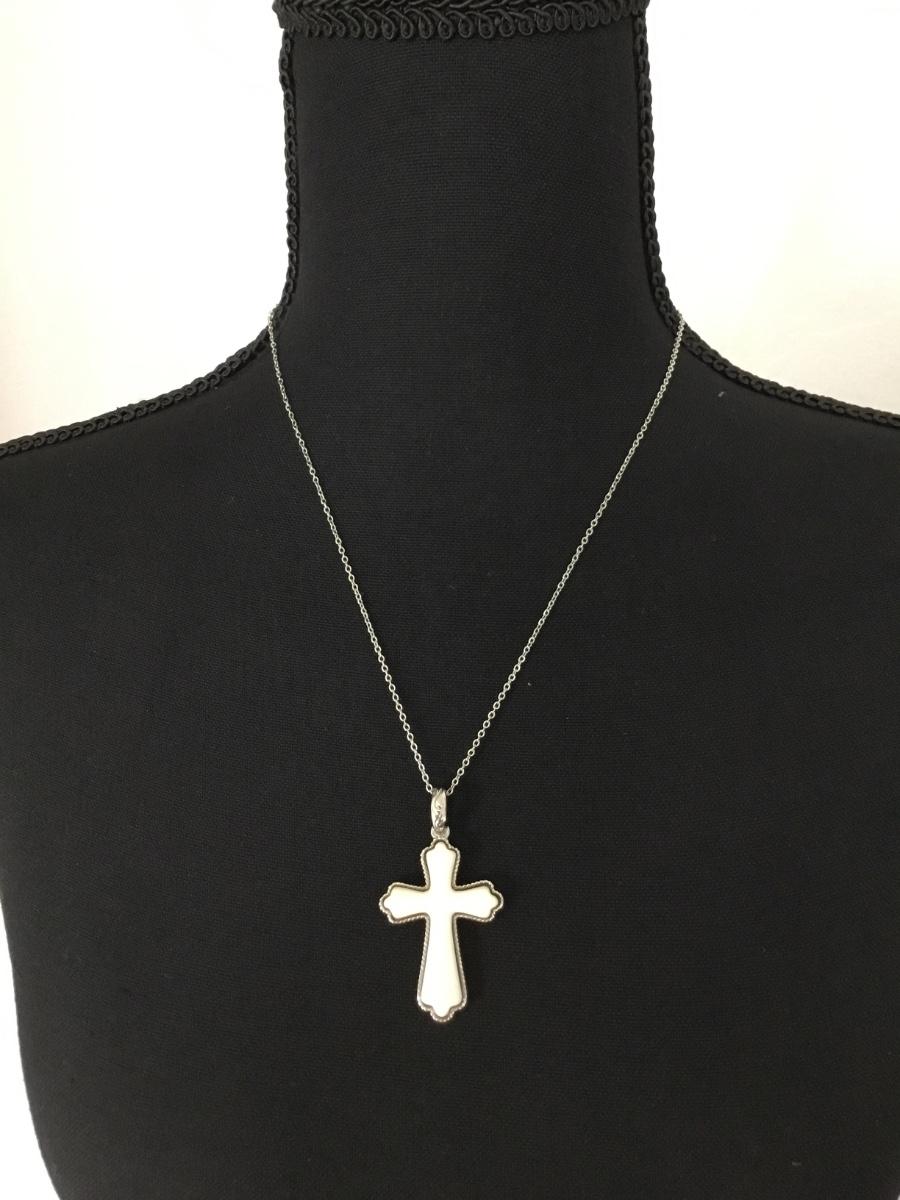 Stainless steal marked white cross necklace | EstateSales.org
