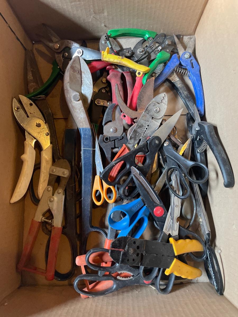 Box of clippers, snippers, and scissors | EstateSales.org